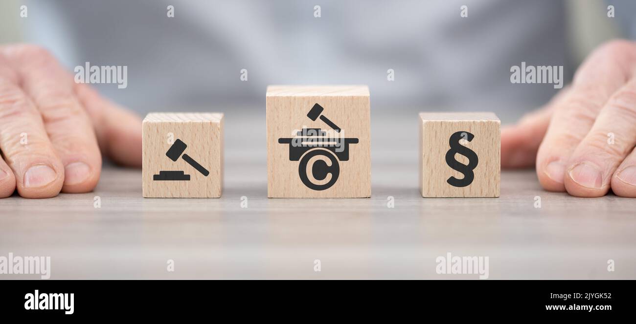 Wooden blocks with symbol of copyright concept Stock Photo - Alamy