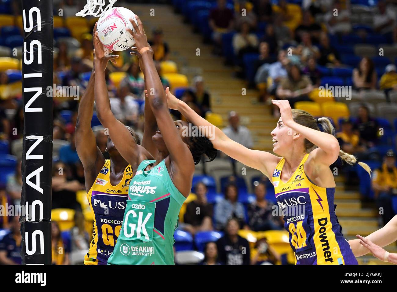 Kadie-Ann Dehaney of the Vixens competes for the ball against Peace ...