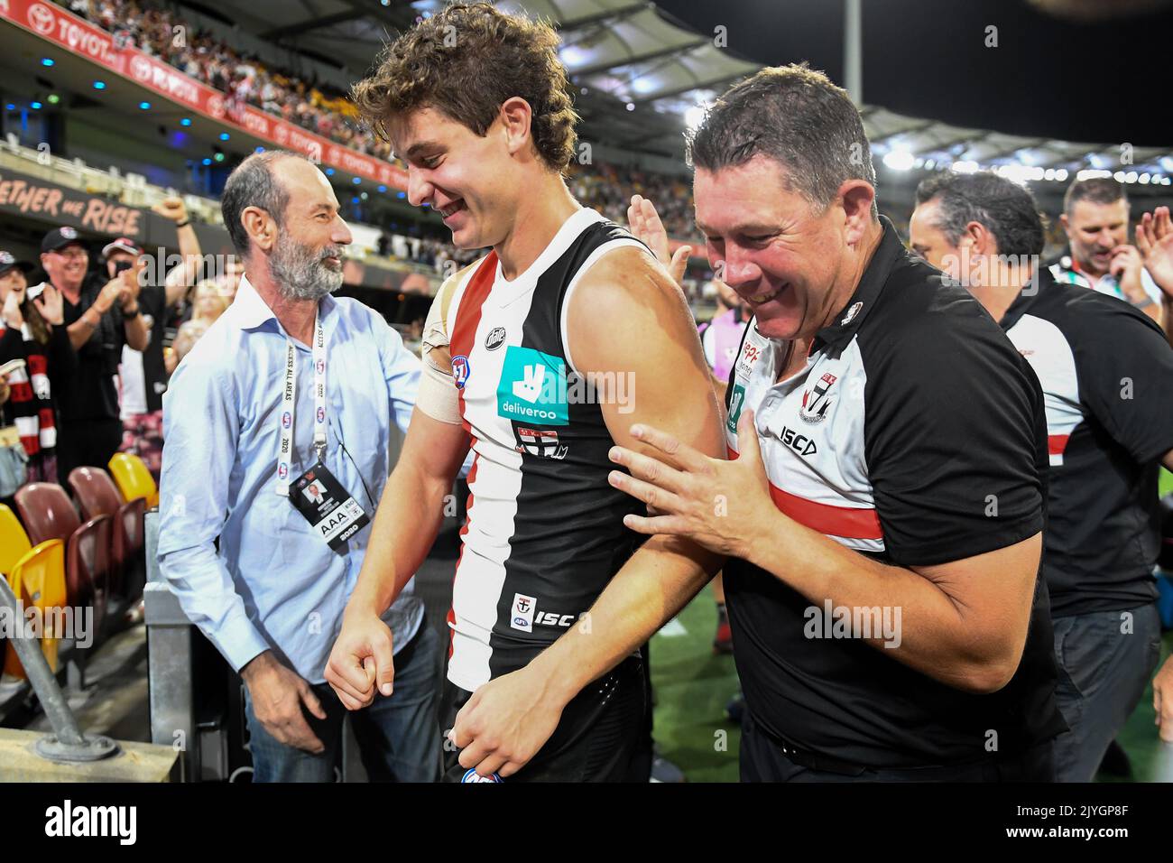 Nick Coffield of the Saints and coach Brett Ratten celebrate following ...