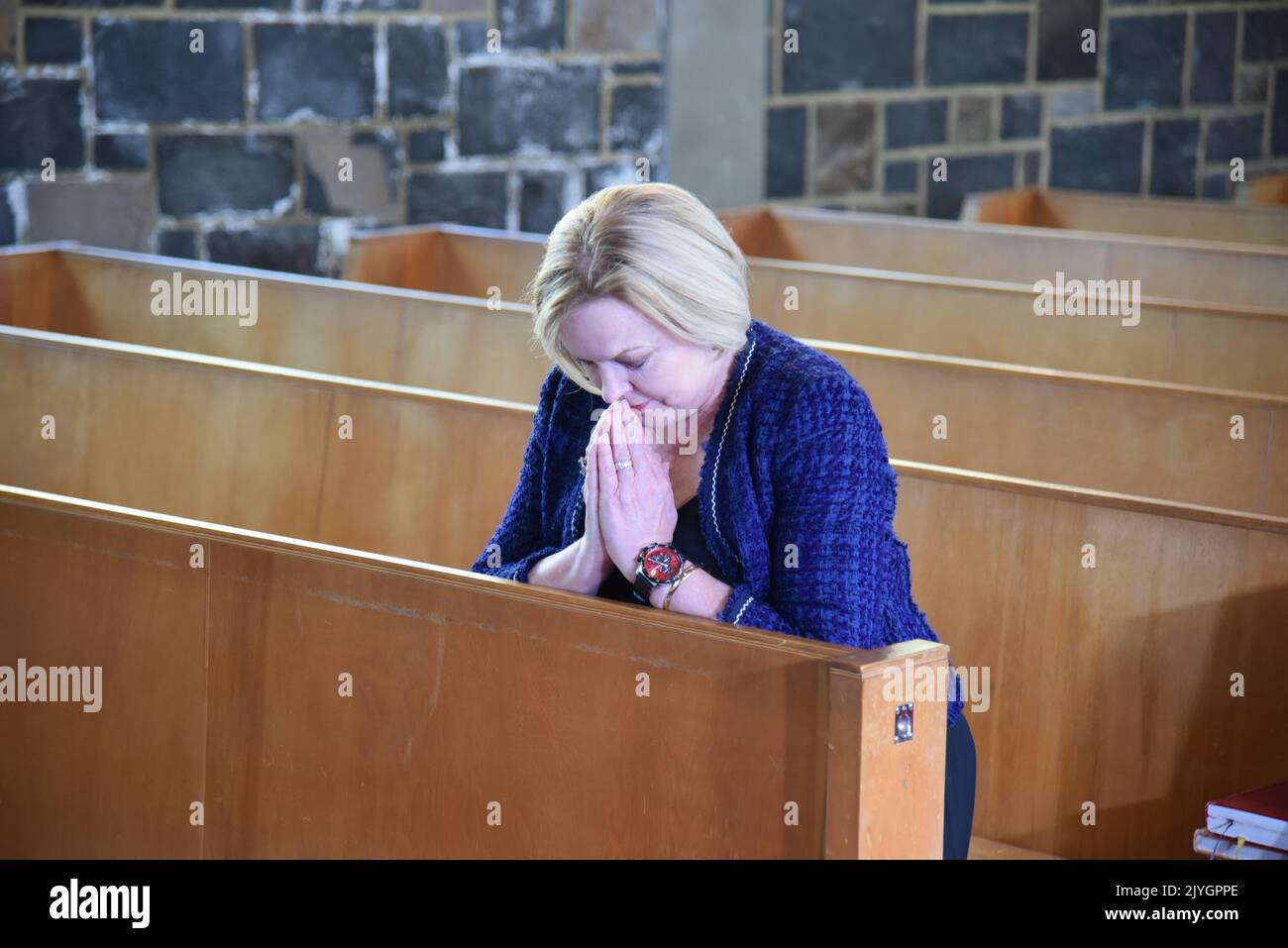 New Zealand Opposition Leader Judith Collins stops to pray at St Thomas ...