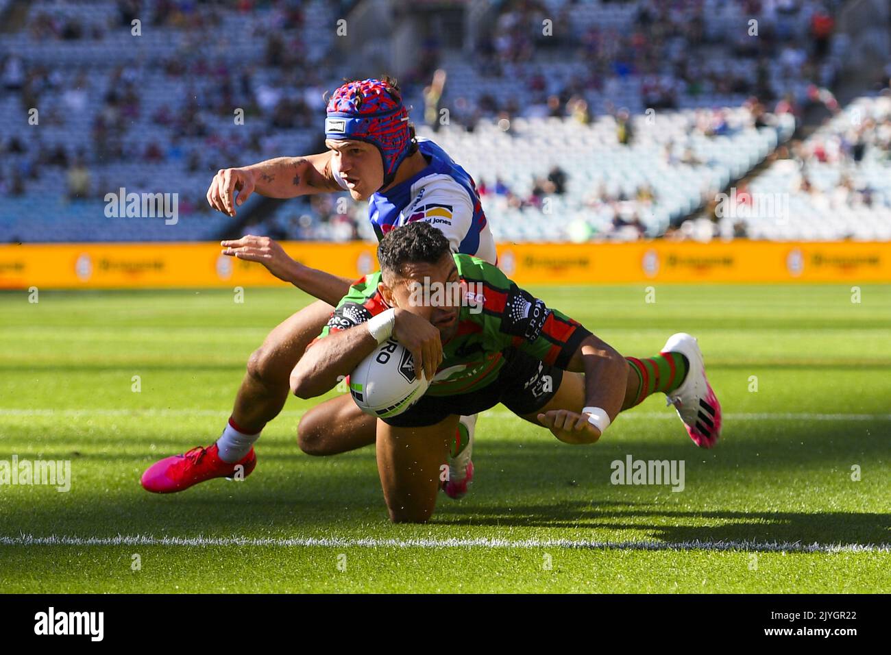 Alex Johnston of the Rabbitohs scores a try during the second NRL ...