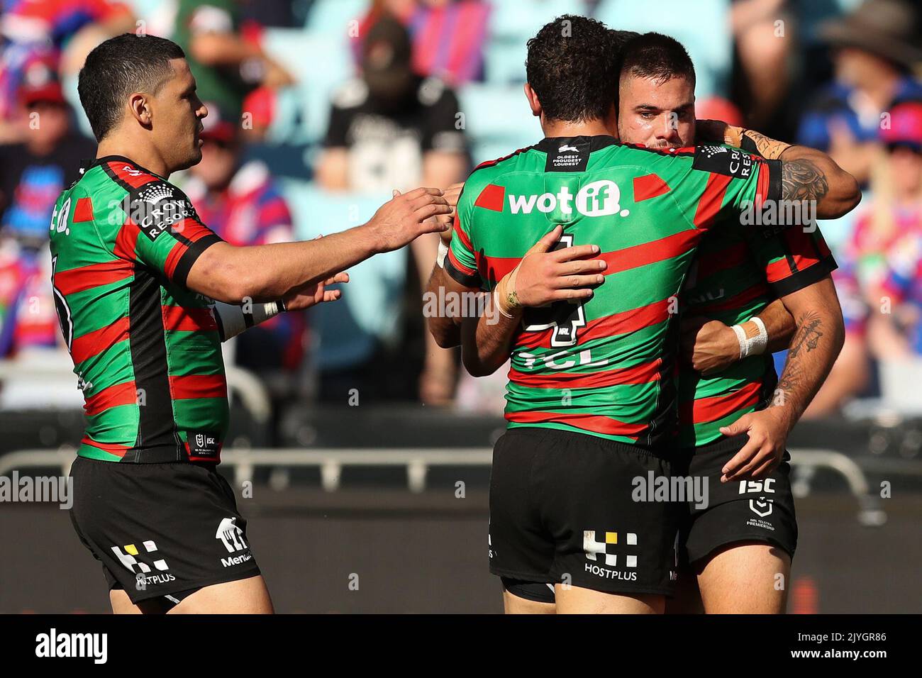 Corey Allan of the Rabbitohs celebrates scoring a try with team mates ...