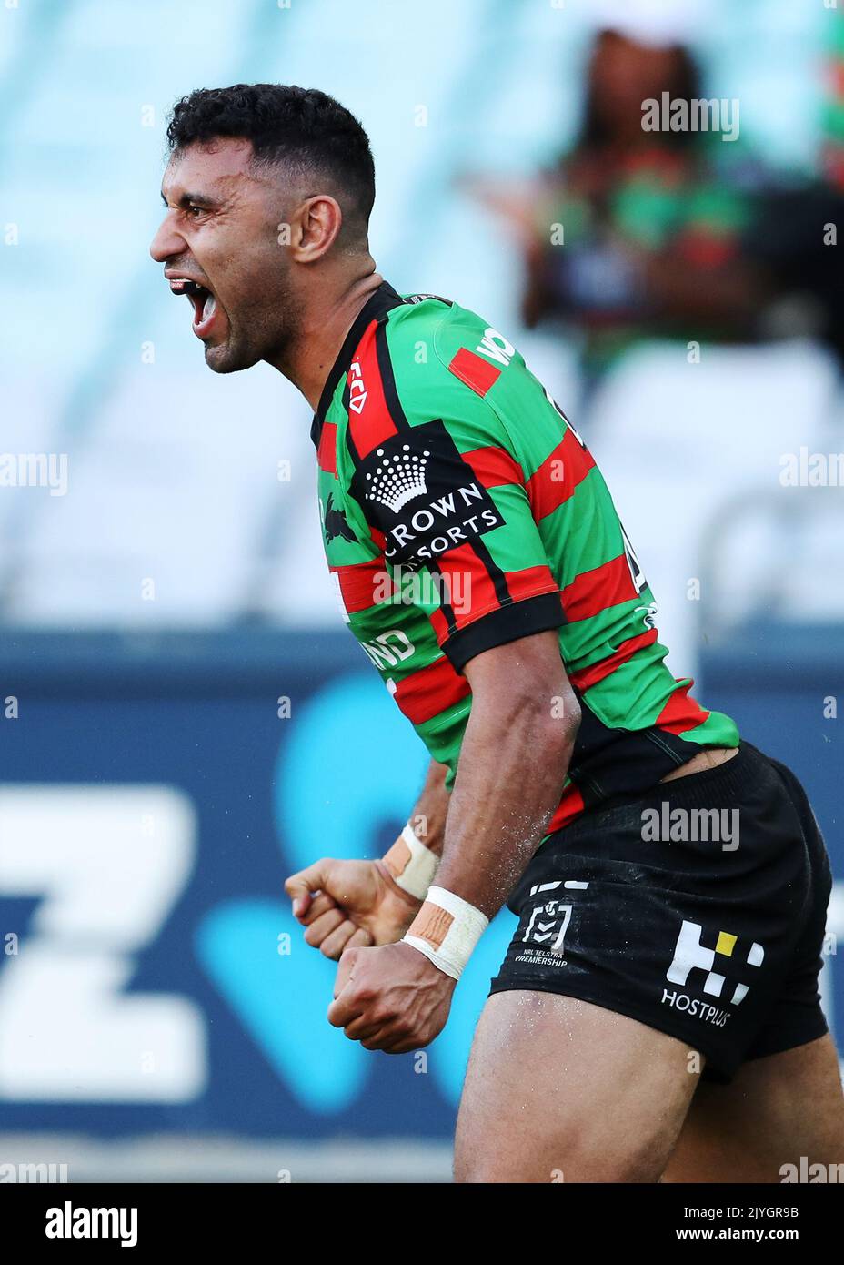 Alex Johnston of the Rabbitohs celebrates scoring a try during the ...