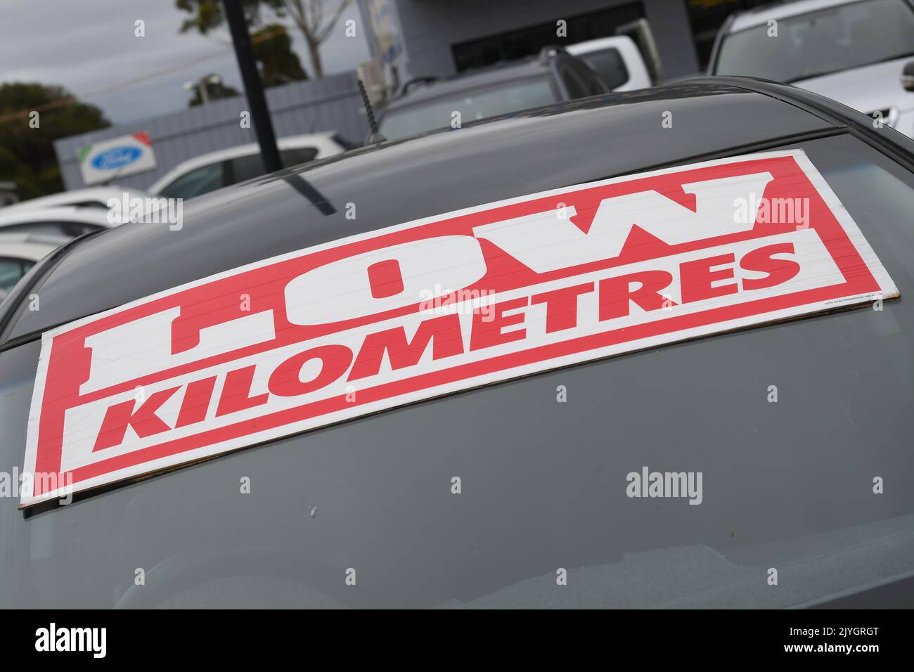 General view of signage on a used car at a car dealership in Melbourne ...