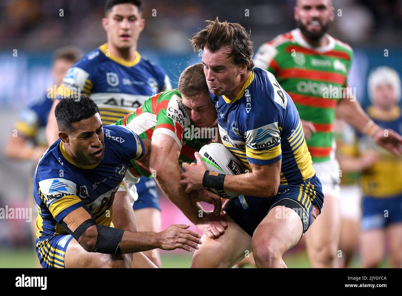 Clint Gutherson of the Eels (right) competes with Campbell Graham of ...