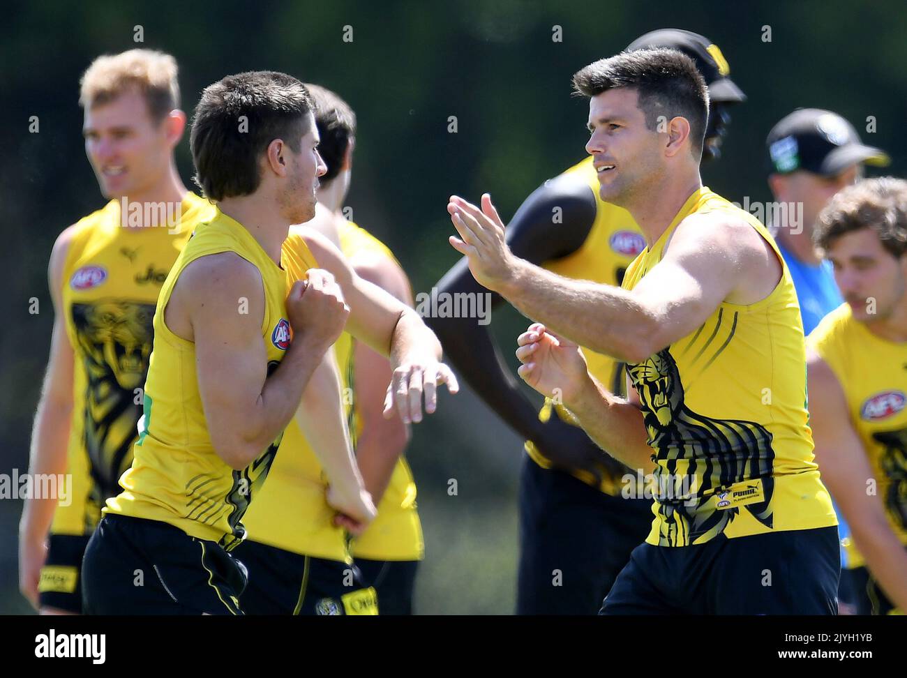 Liam Baker (left) and Trent Cotchin play-fight during Richmond Tigers ...