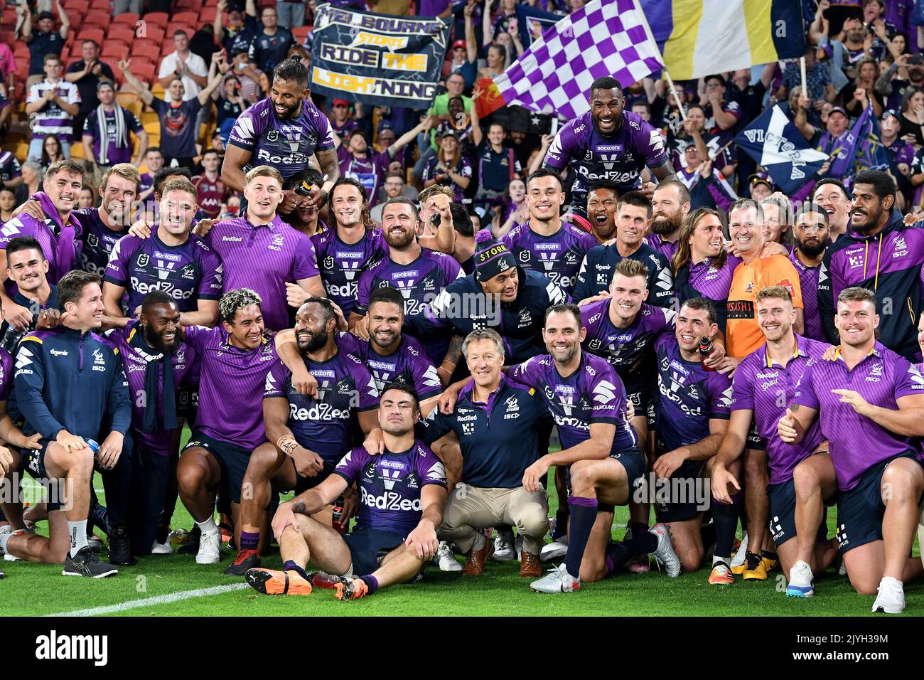 Melbourne Storm players with coach Craig Bellamy and staff assemble for ...