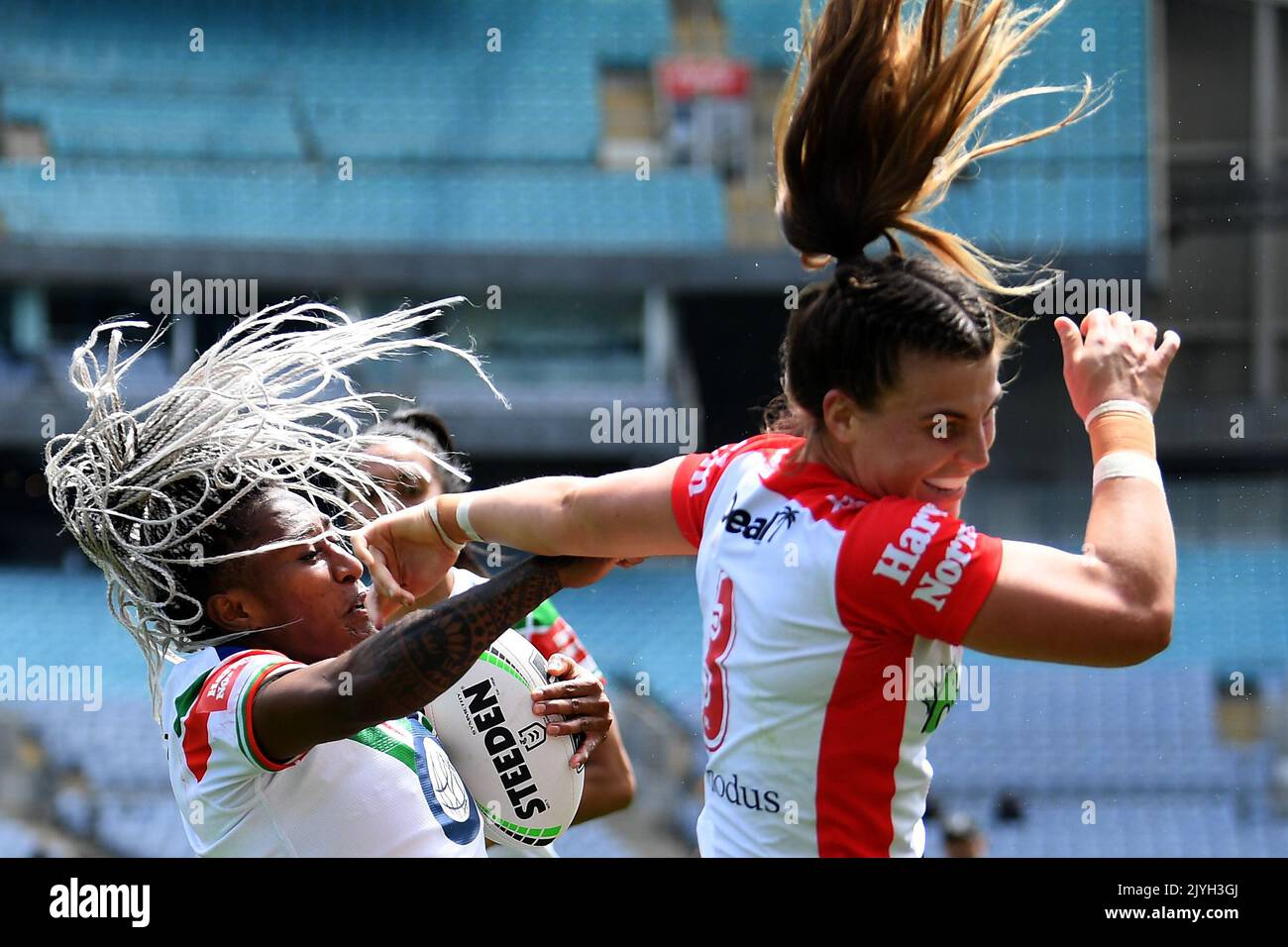 Ellia Green of the Warriors and Jessica Sergis of the Dragons collide ...