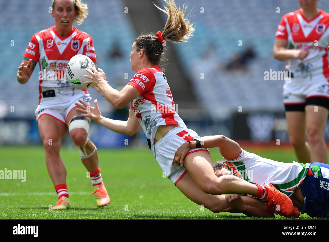 Sam Brenner of the Dragons off loads the ball during the NRLW match ...