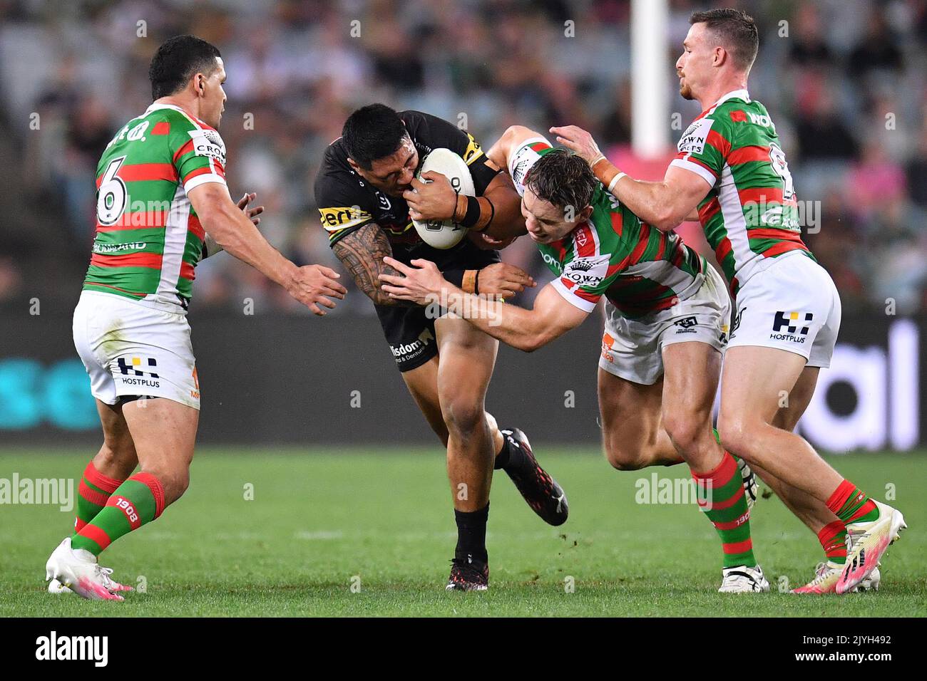 Moses Leota of the Panthers is tackled by Cody Walker Cameron Murray ...