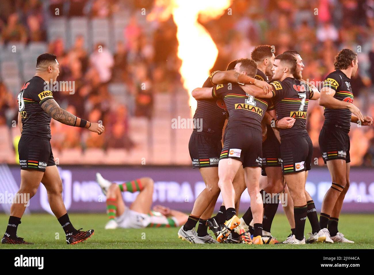 The Panthers celebrate their win over the Rabbitohs during the NRL ...