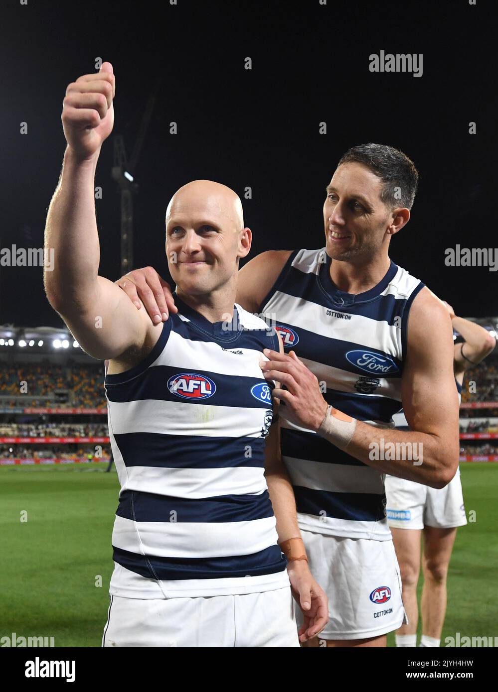 Gary Ablett (left) and Harry Taylor of the Cats celebrate following the ...