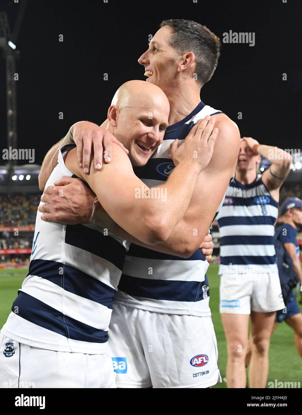 Gary Ablett (left) and Harry Taylor of the Cats celebrate following the ...