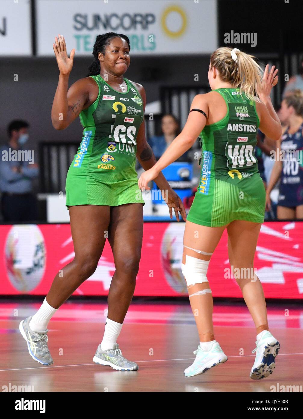 Jhaniele Fowler (left) of the Fever celebrates shooting a goal with ...
