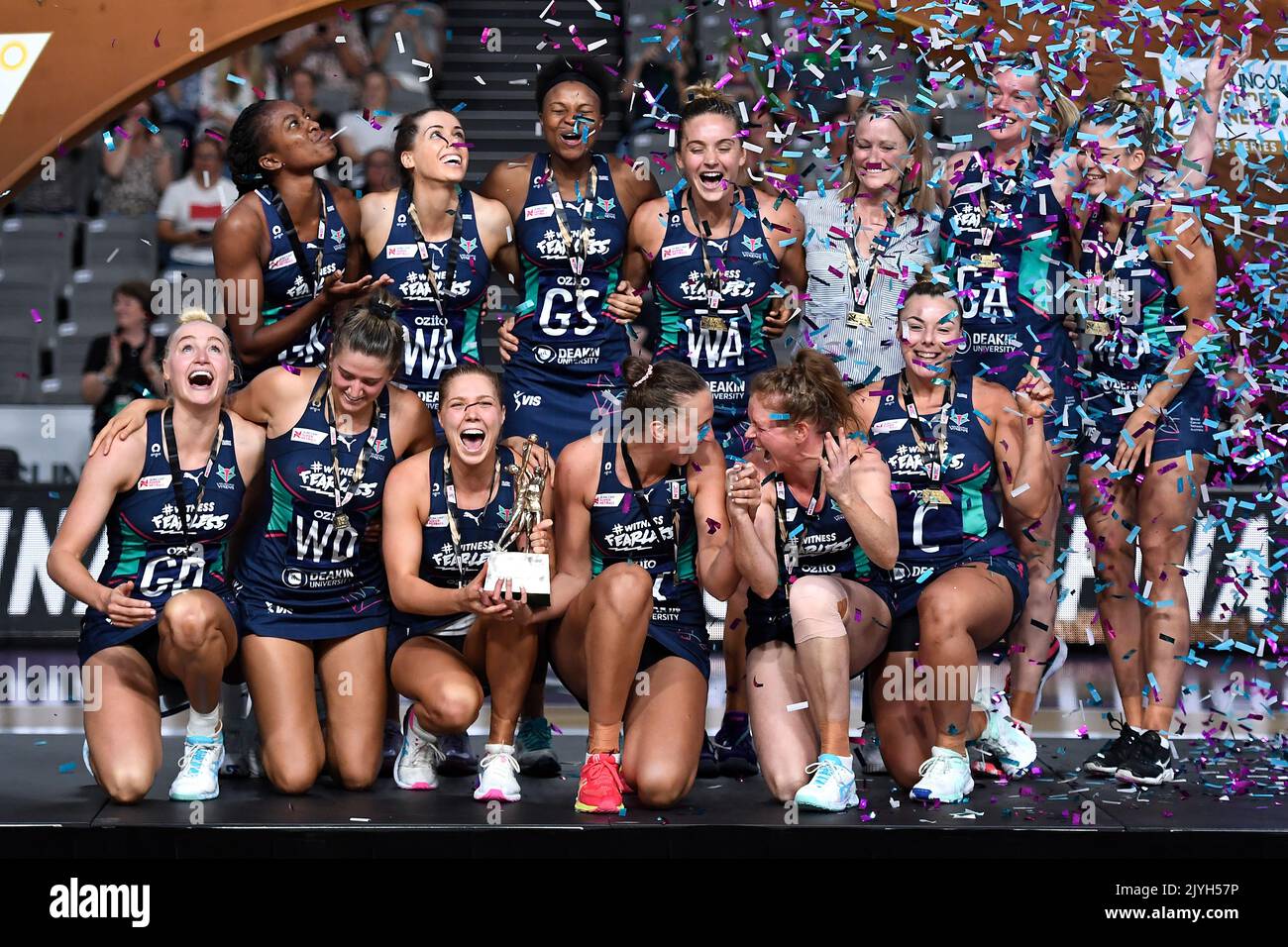 Melbourne Vixens players celebrate with the trophy after their victory ...