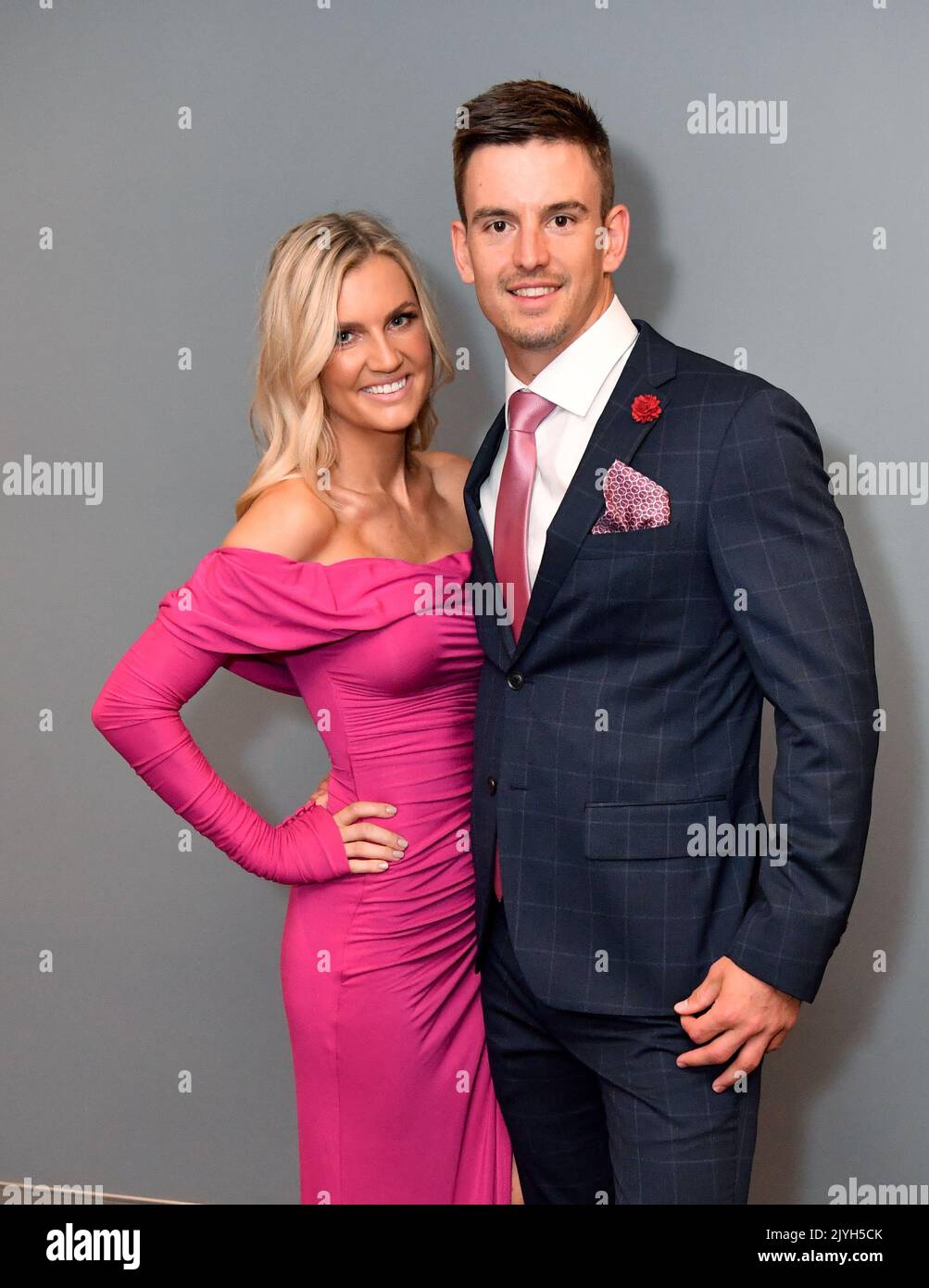 Jarryd Lyons of the Lions and his partner Savahna Lyons are seen ...
