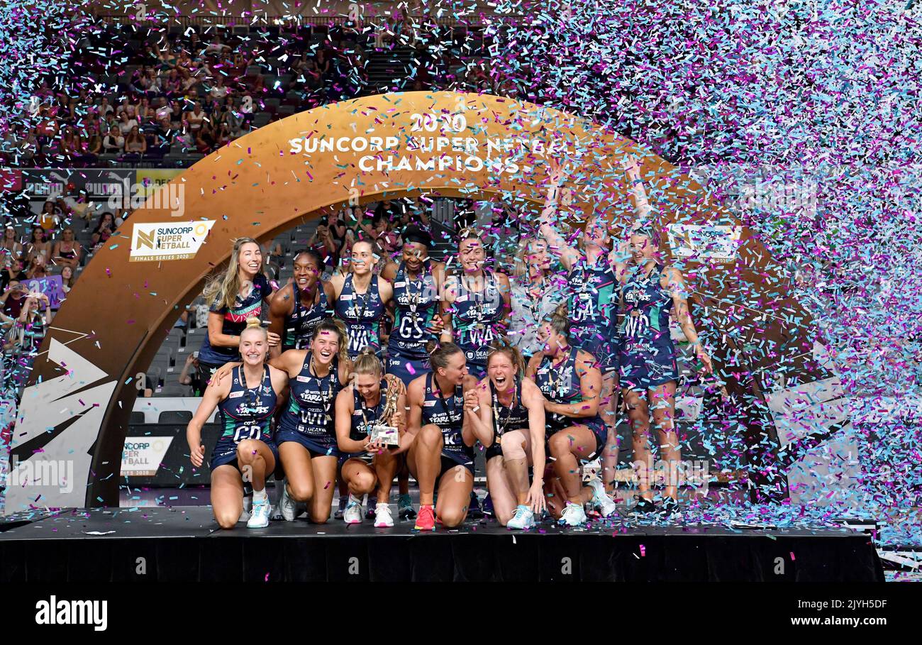 Vixens players celebrate with the trophy after winning the Super ...