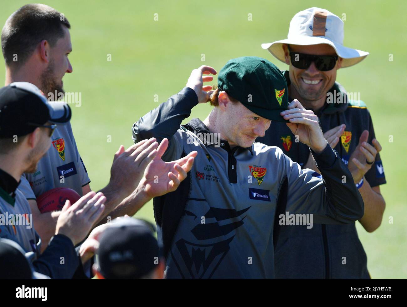 Tom Andrews of the Tigers is presented with his cap during day 1 of the ...