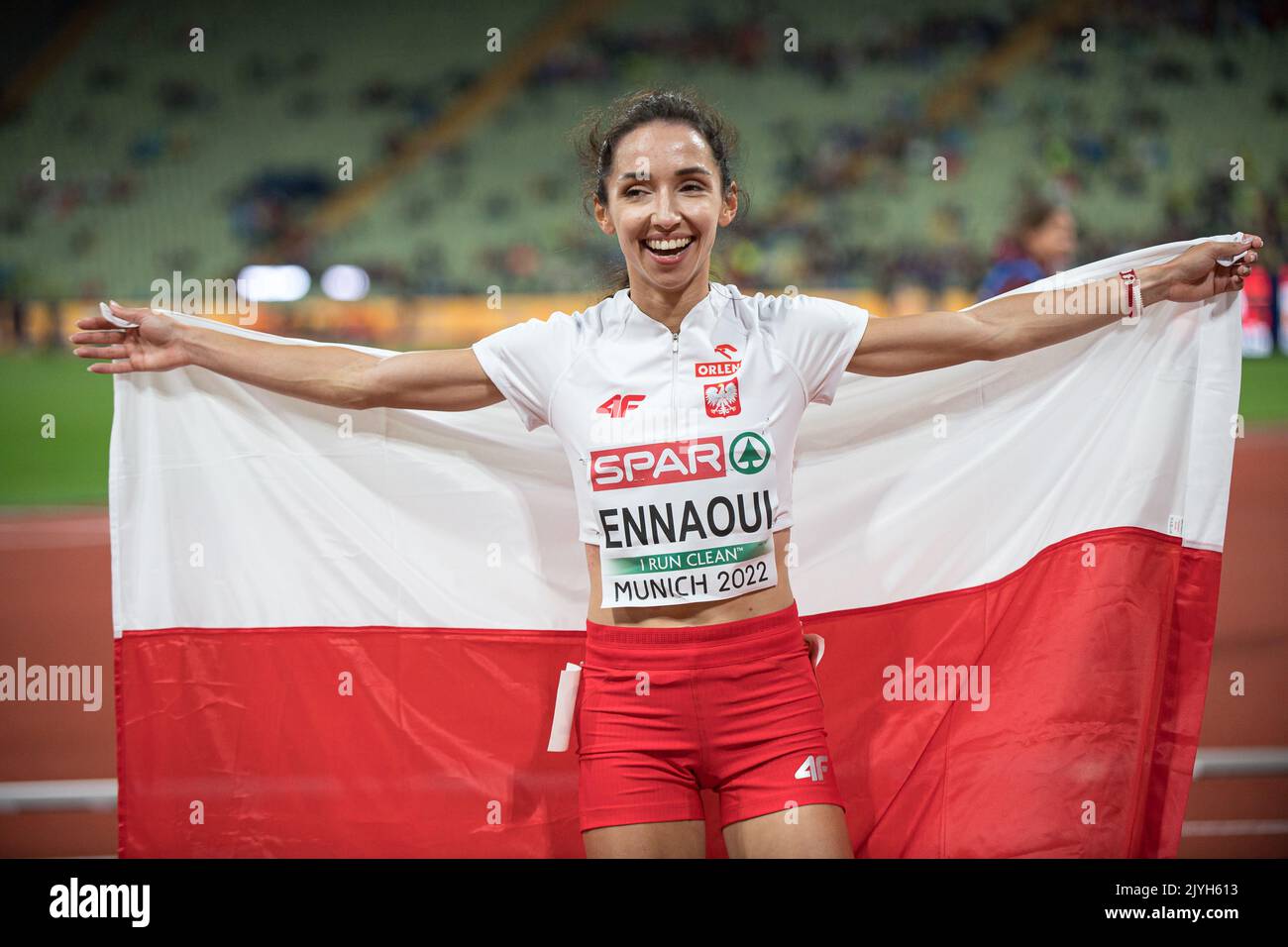 Sofia Ennaoui with her country's flag at the European Athletics Championships in Munich 2022 ...