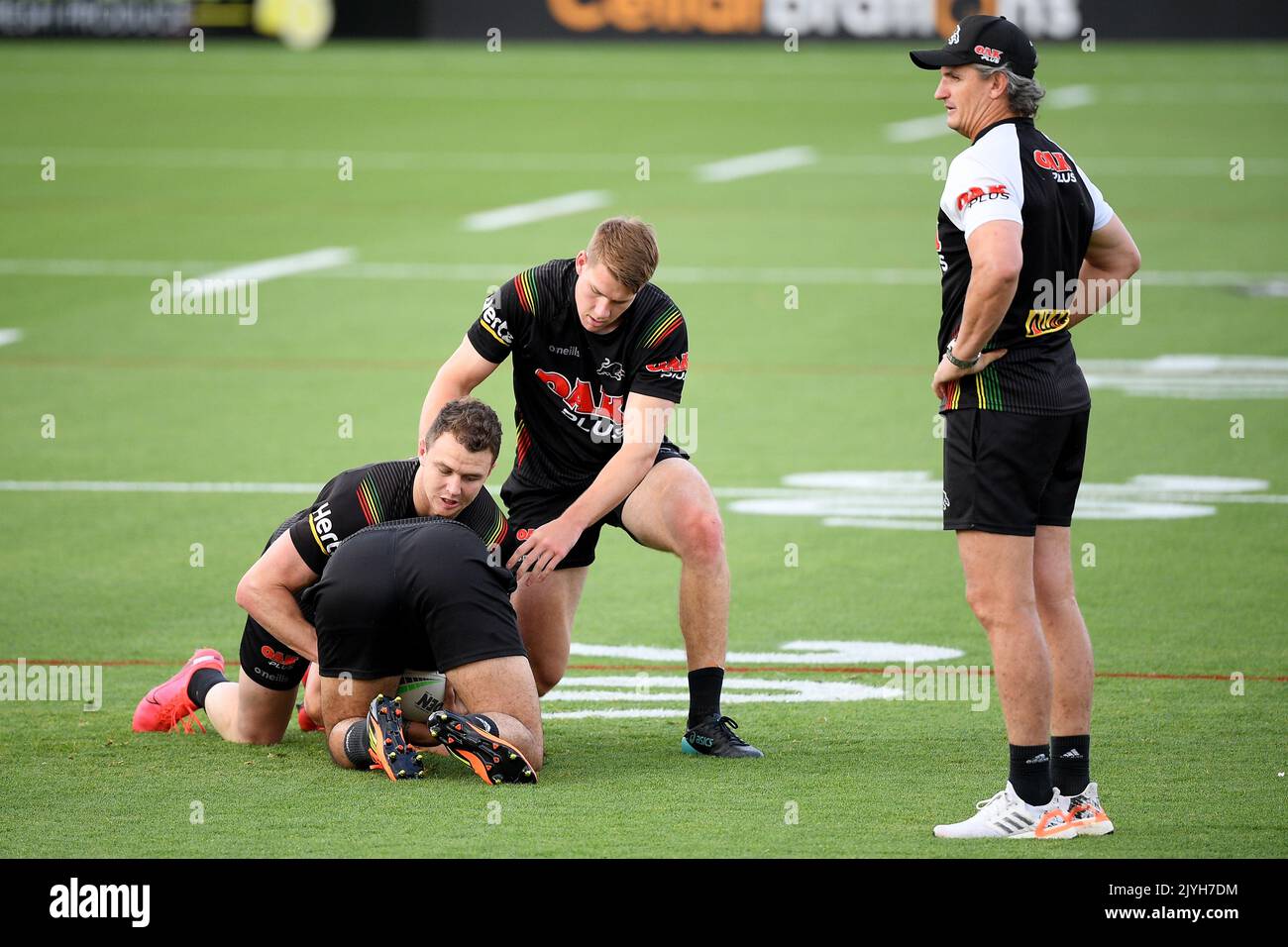 Panthers coach Ivan Cleary (right) watches on during an open training ...