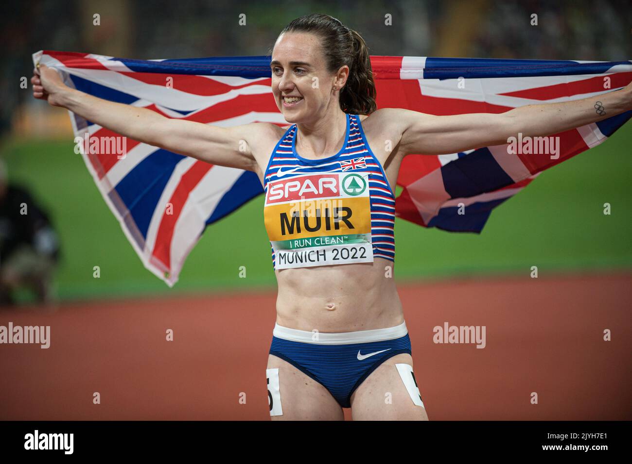 Laura Muir with her country's flag as the winner of the 1500 meters at ...