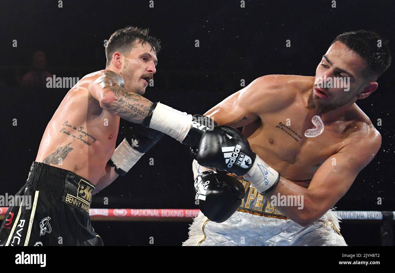 Ben Mahoney (left) is seen landing a punch on Benjamin Hussain (right ...