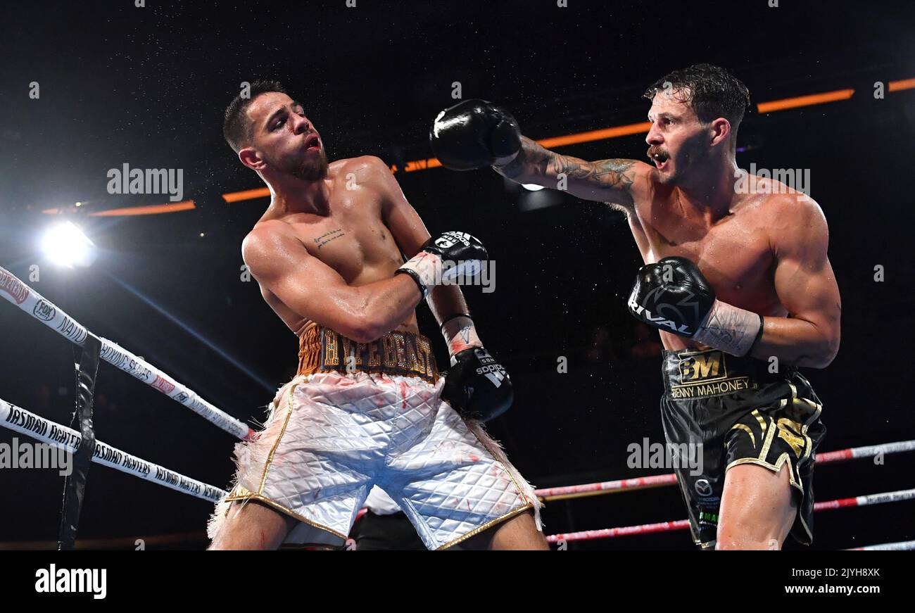 Ben Mahoney (right) is seen landing a punch on Benjamin Hussain (left ...
