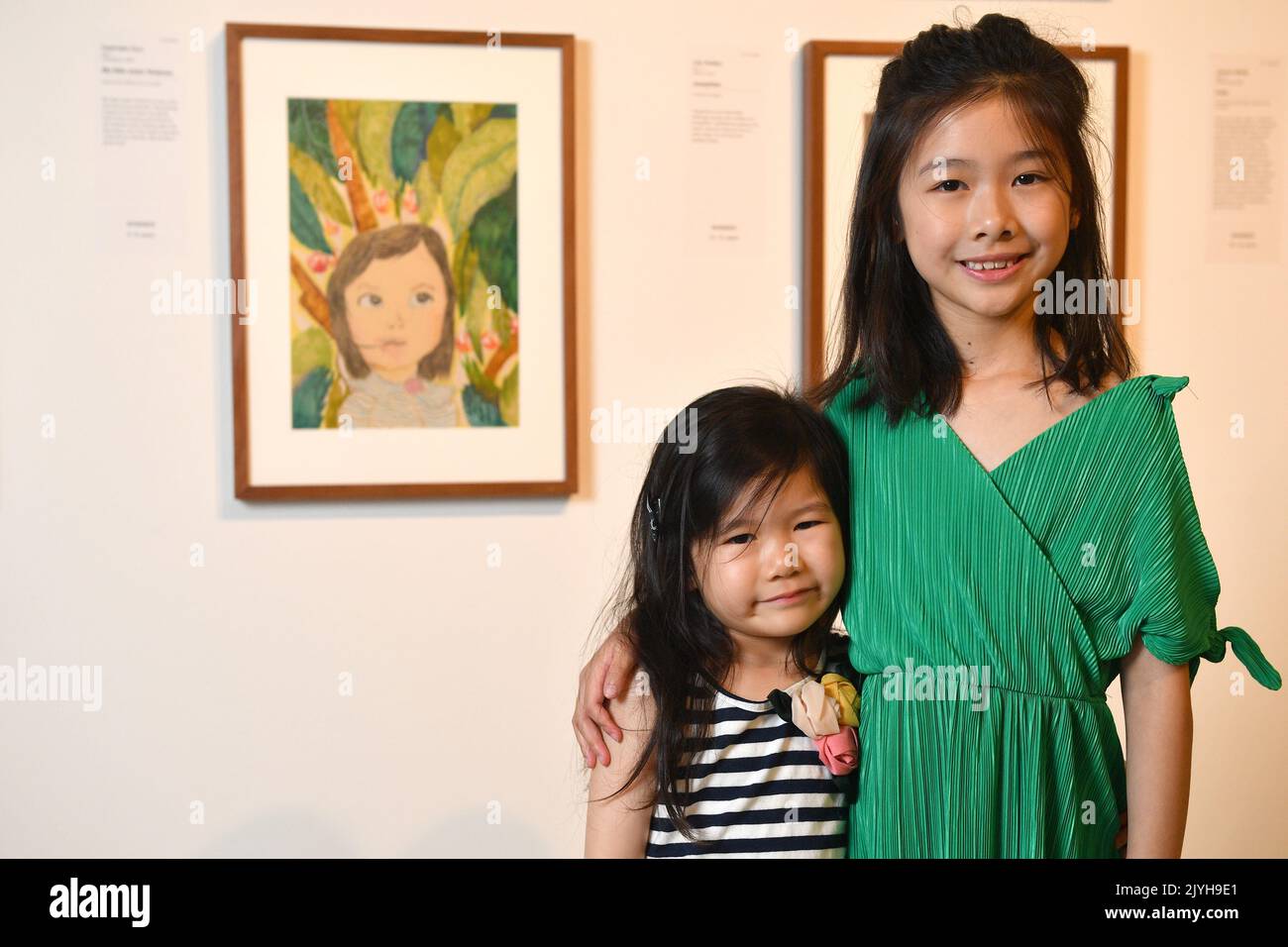 Gabrielle Guo, 7, poses for a photograph her sister Vivienne and her ...