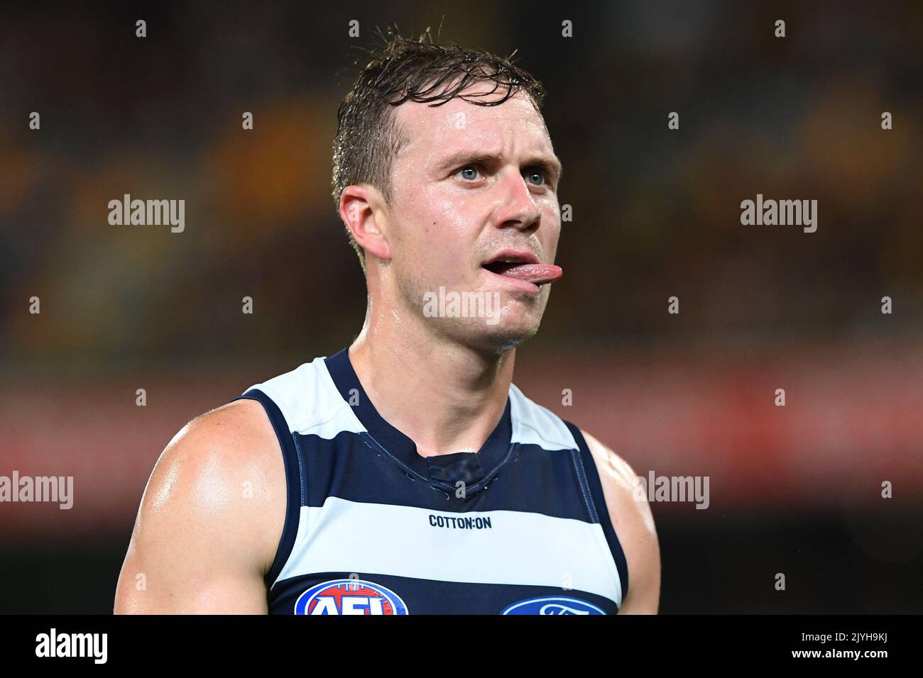 Mitch Duncan of the Cats reacts to the crowd after kicking a goalduring ...
