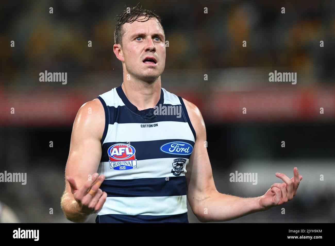 Mitch Duncan of the Cats reacts to the crowd after kicking a goalduring ...