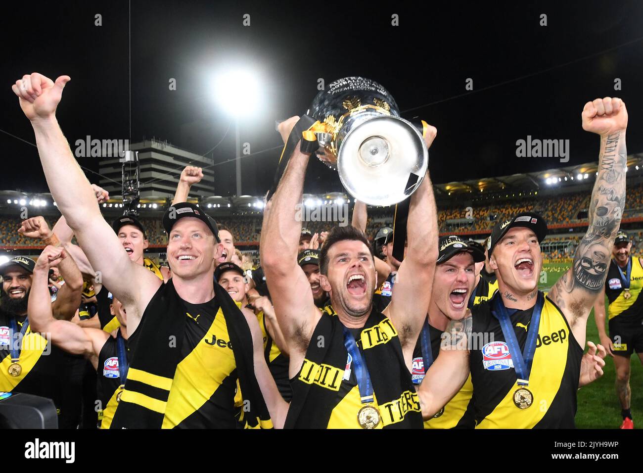 The Tigers celebrate with the AFL Premiership Cup after their win over ...