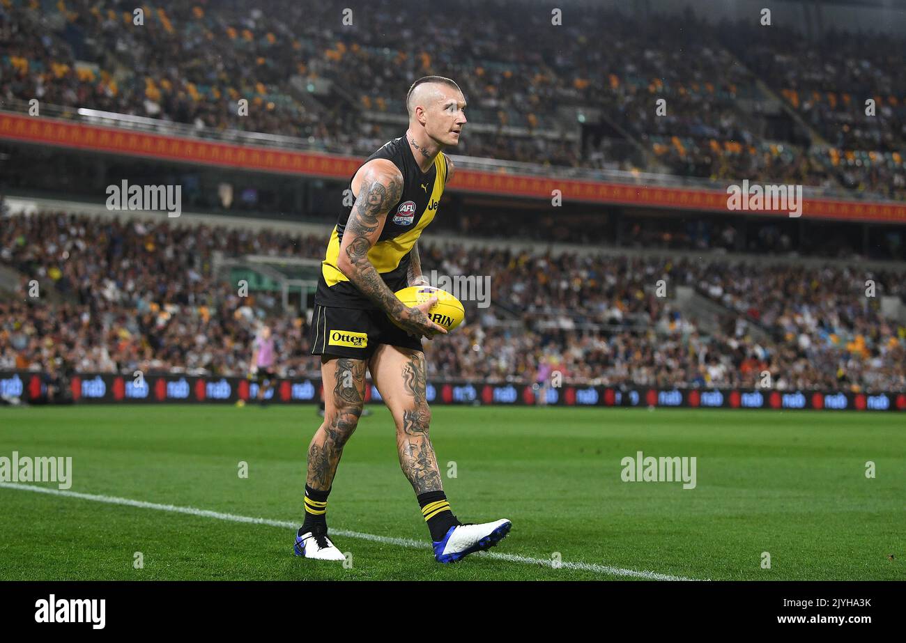 Dustin Martin of the Tigers looks on before taking a set shot at goal ...
