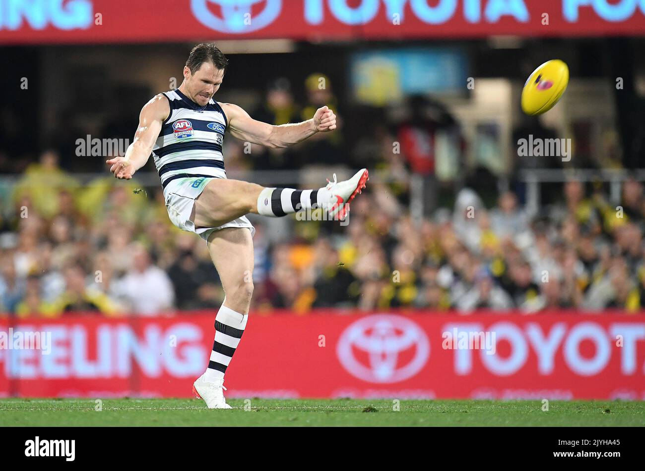 Patrick Dangerfield of the Cats kicking for goal during the AFL Grand ...