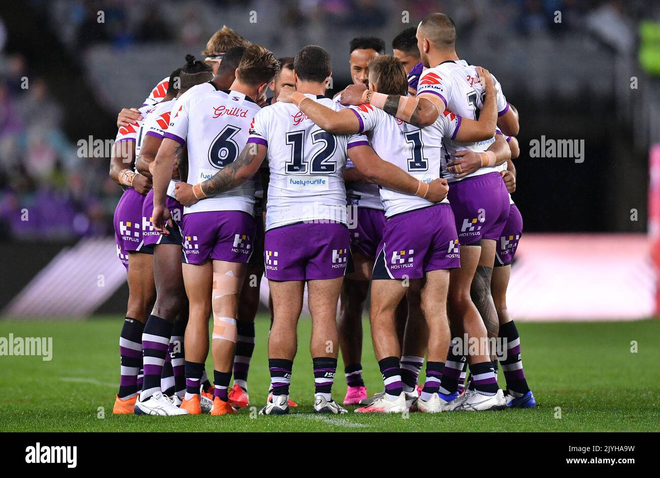 Storm players huddle prior to the NRL Grand Final between the Penrith ...