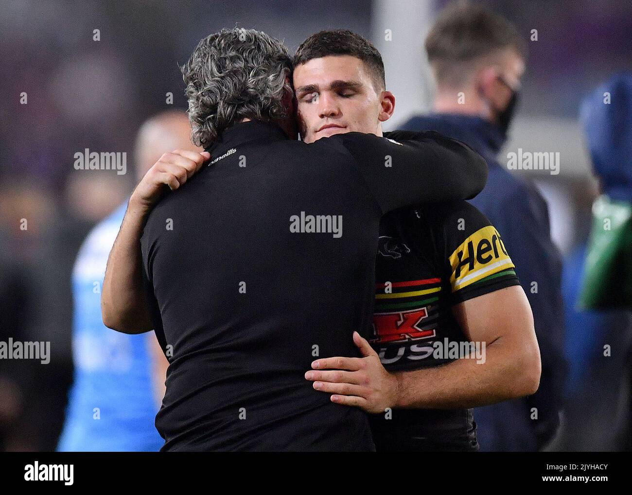 Nathan Cleary (right) reacts with father and coach Ivan Cleary ...