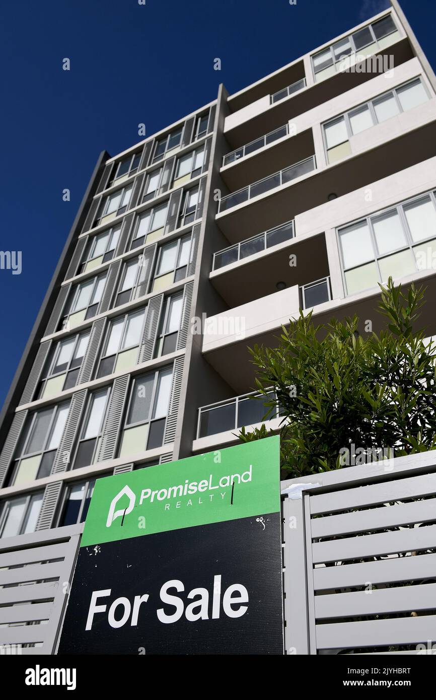 For Sale signs are seen outside a unit block in Sydney, Wednesday ...