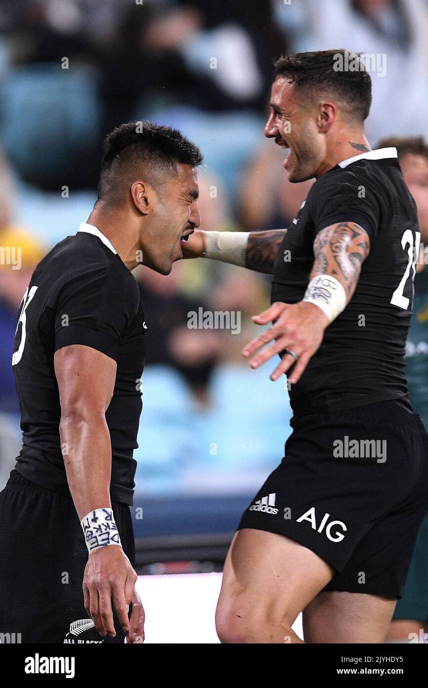 Rieko Ioane of the All Blacks (left) celebrates with teammates after ...