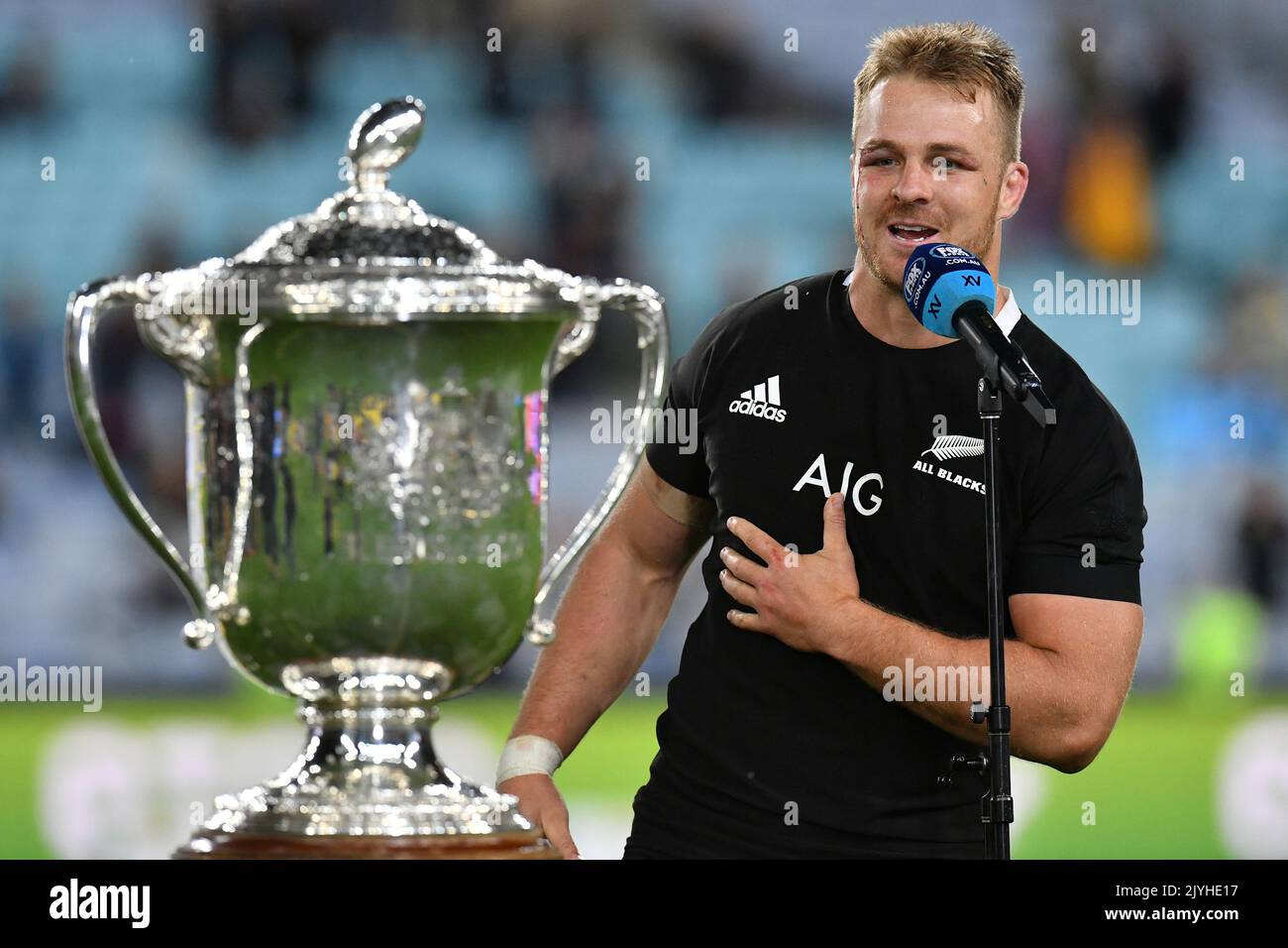 Sam Cane of the All Blacks loos at the Bledisloe Cup trophy after their ...