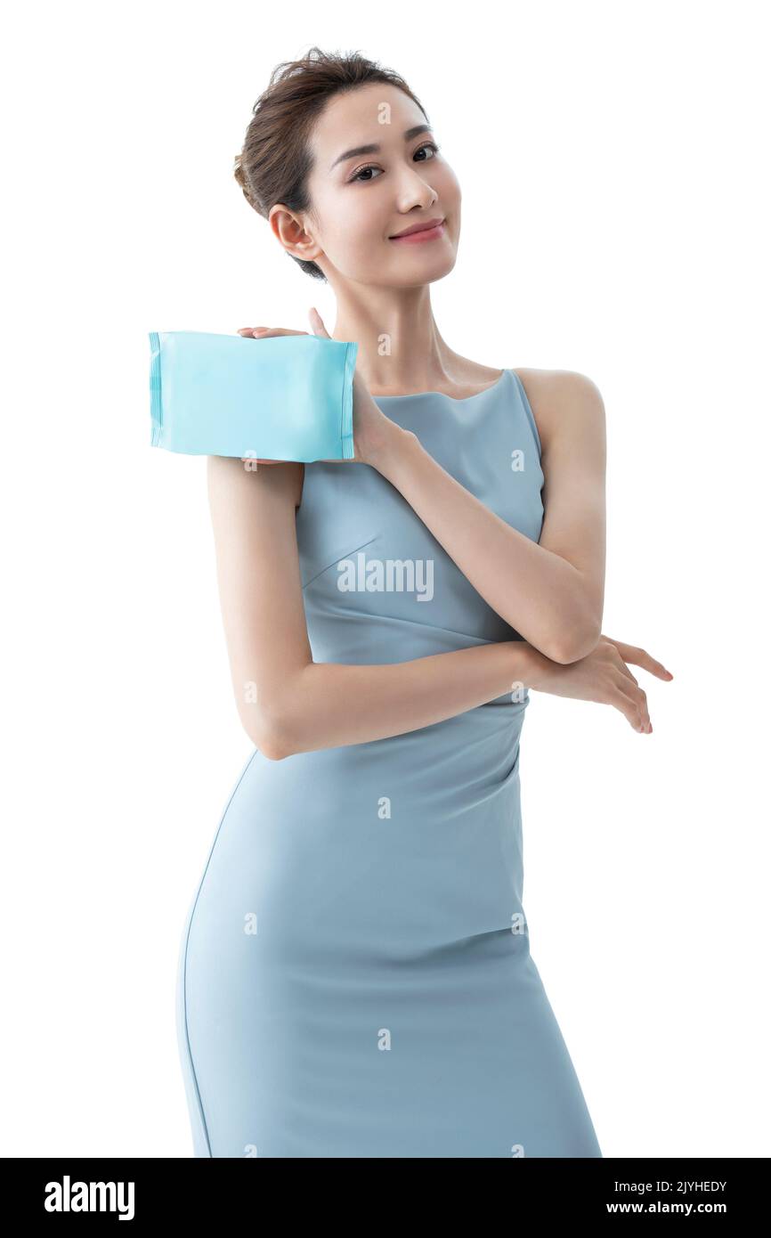 Beautiful young Chinese woman showing wet wipe Stock Photo - Alamy