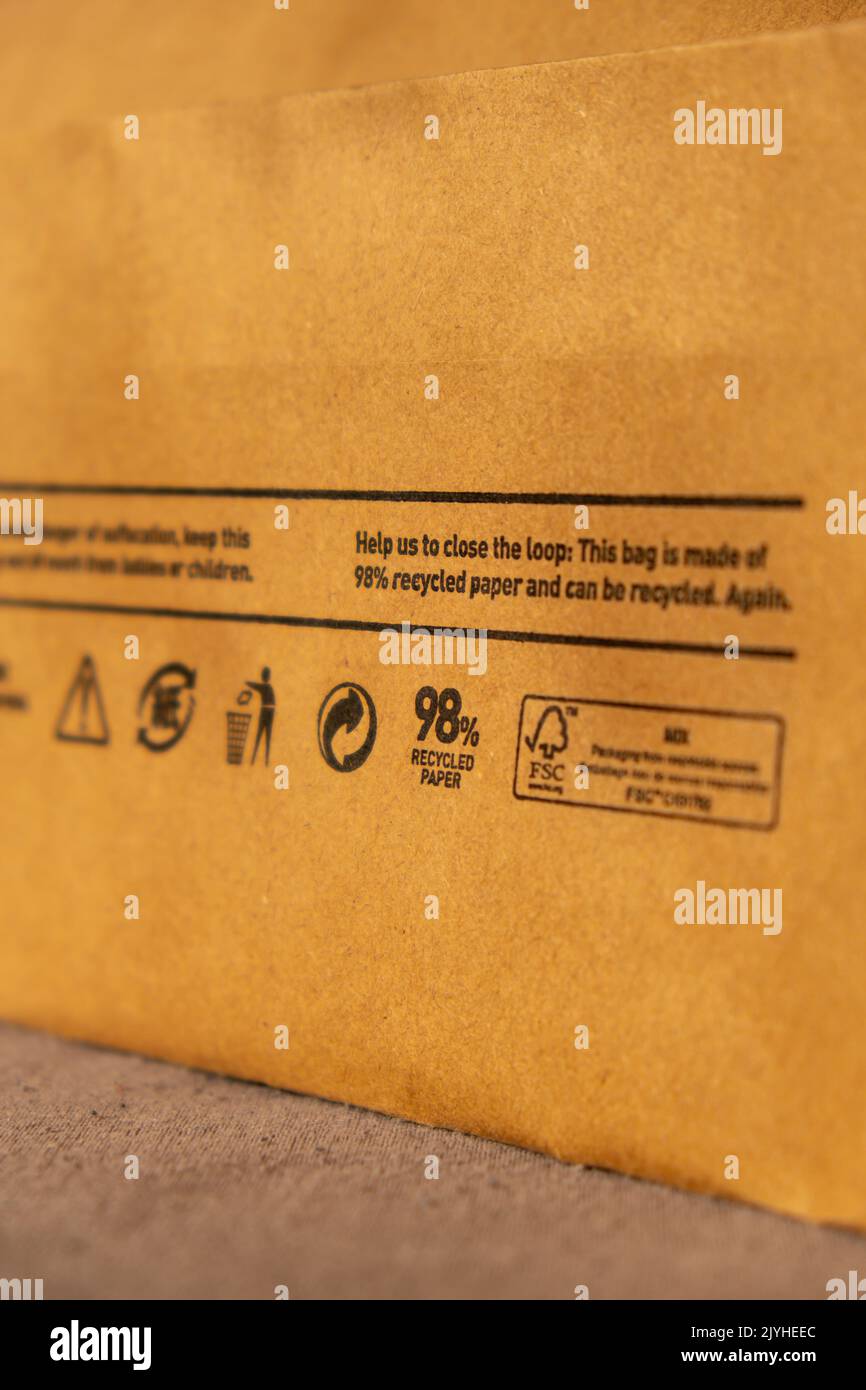 Recycling bag Closeup view of pap sign and other eco-label on Brown ...