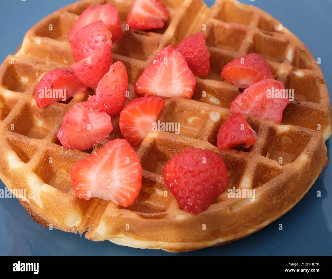 strawberry waffle on a blue table,westgate-on-sea,kent,uk september ...