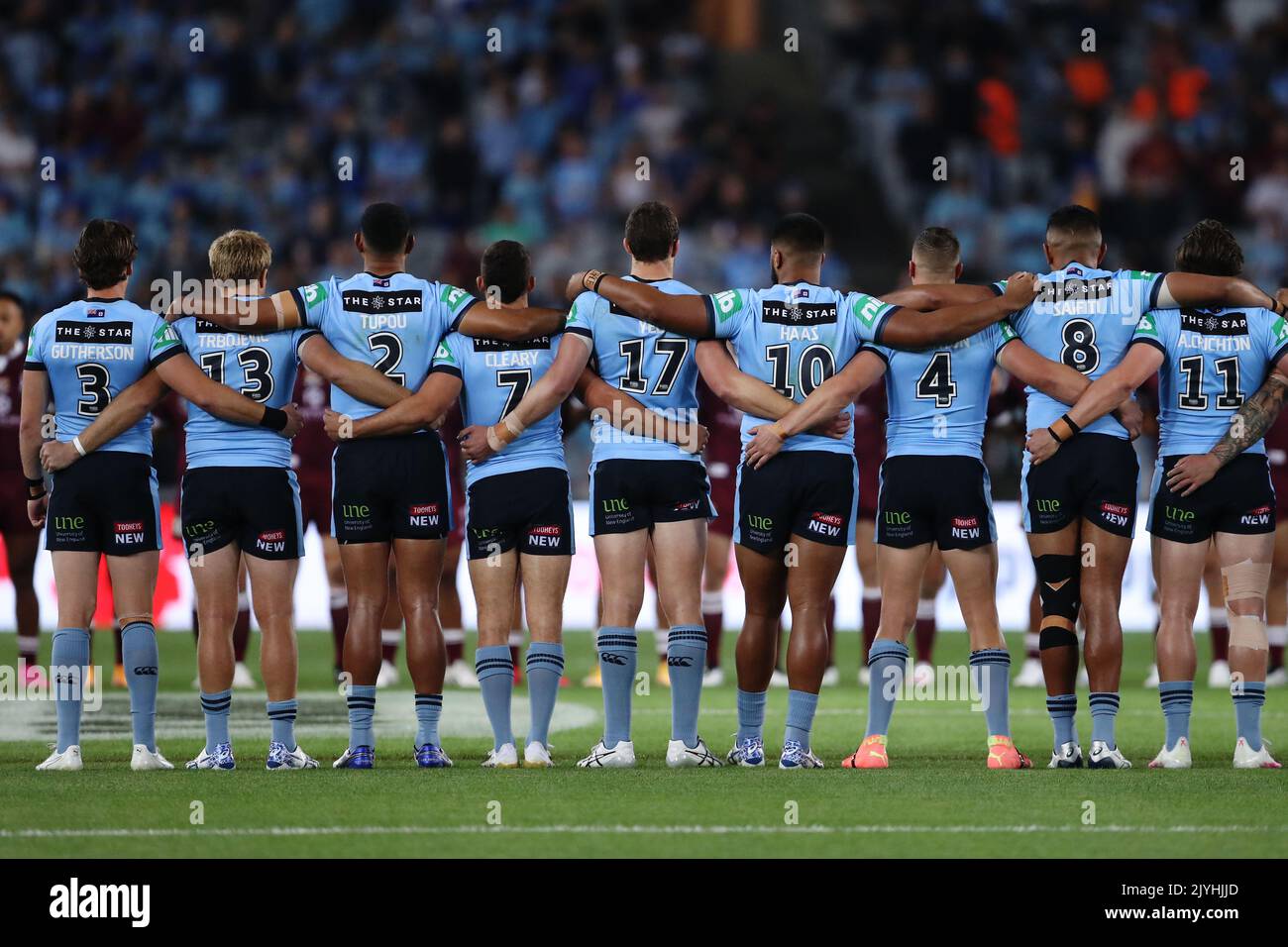 NSW Blues players stand for the national anthem during Game 2 of the ...