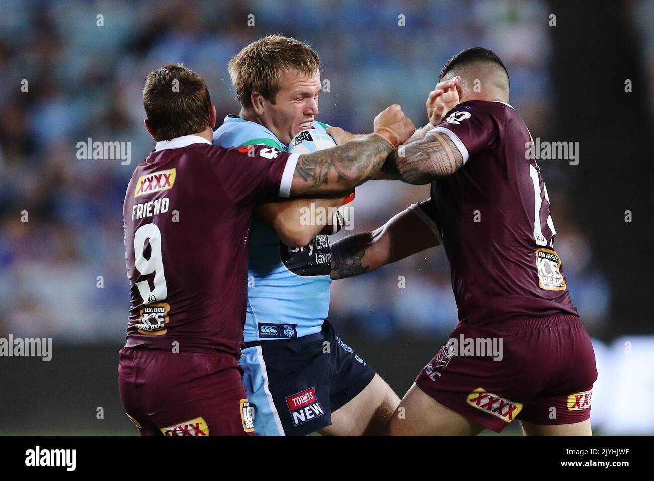 Jake Trbojevic of the Blues is tackled by Jake Friend and Jaydn Su’A of ...