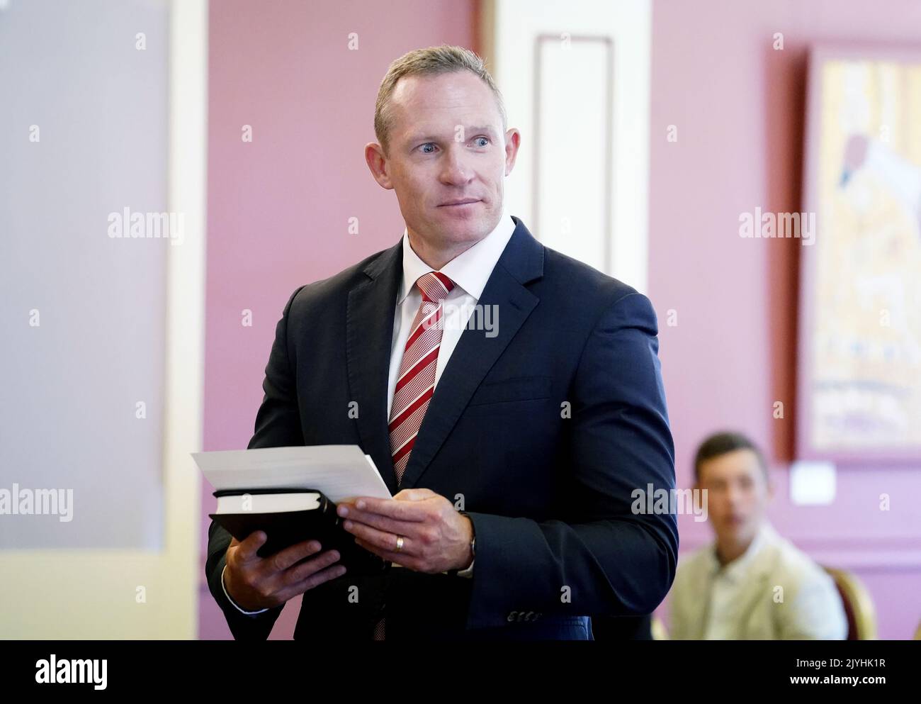 Queensland Minister Mick de Brenni takes an oath during a swearing in ...