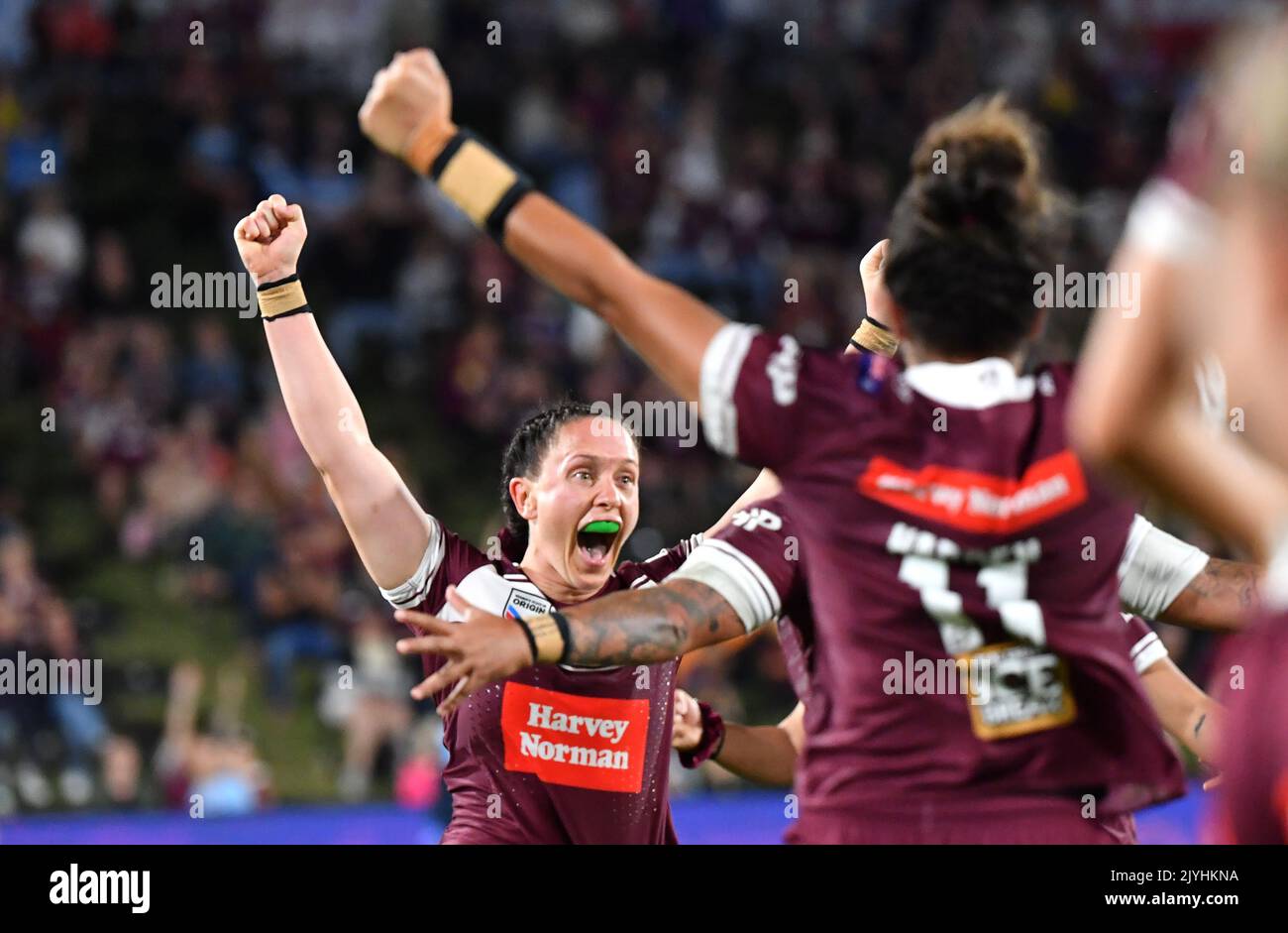 Brittany Breayley (left) of the Maroons celebrates winning on full time ...