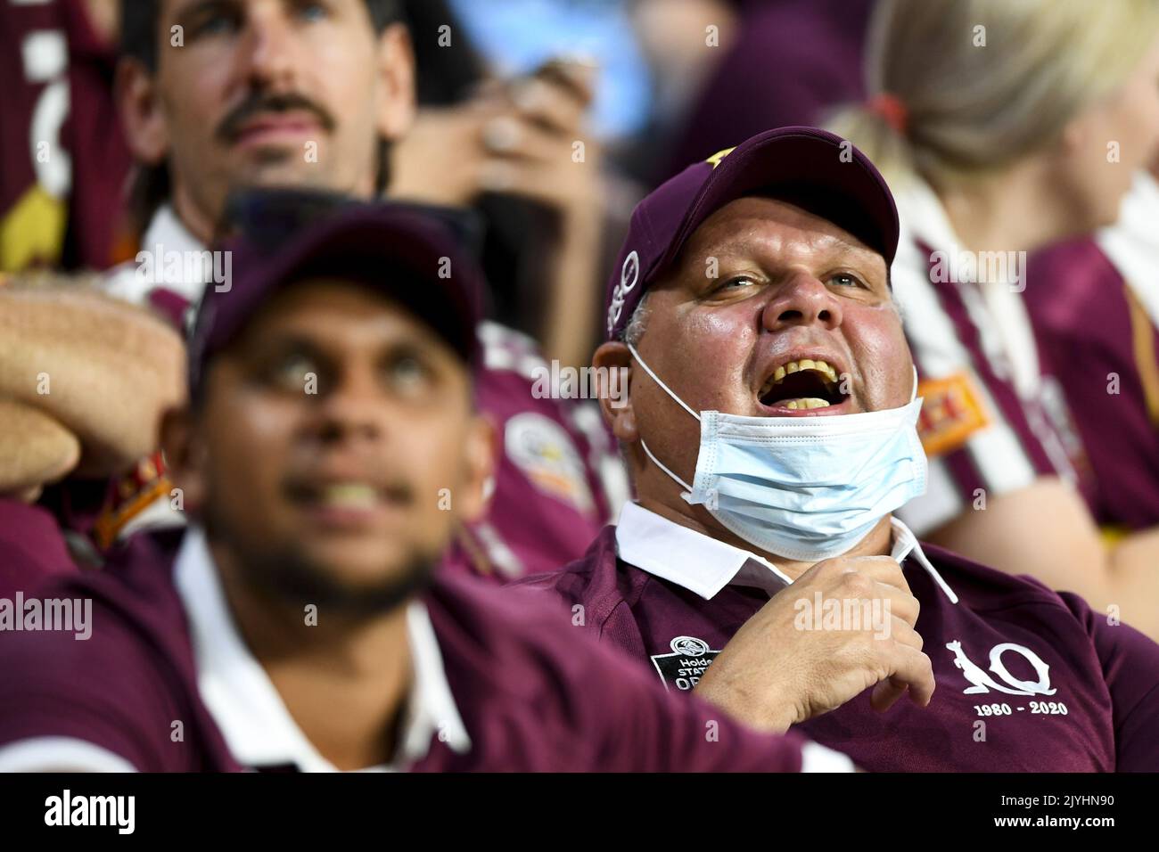 A Maroon fan with face mask shows support during Game 3 of the 2020 ...