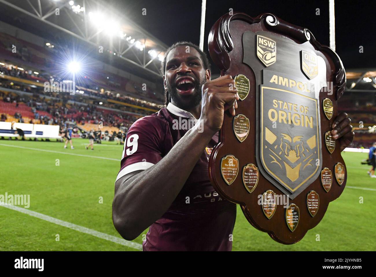 Edrick Lee of the Marrons celebrates with the trophy after winning Game ...