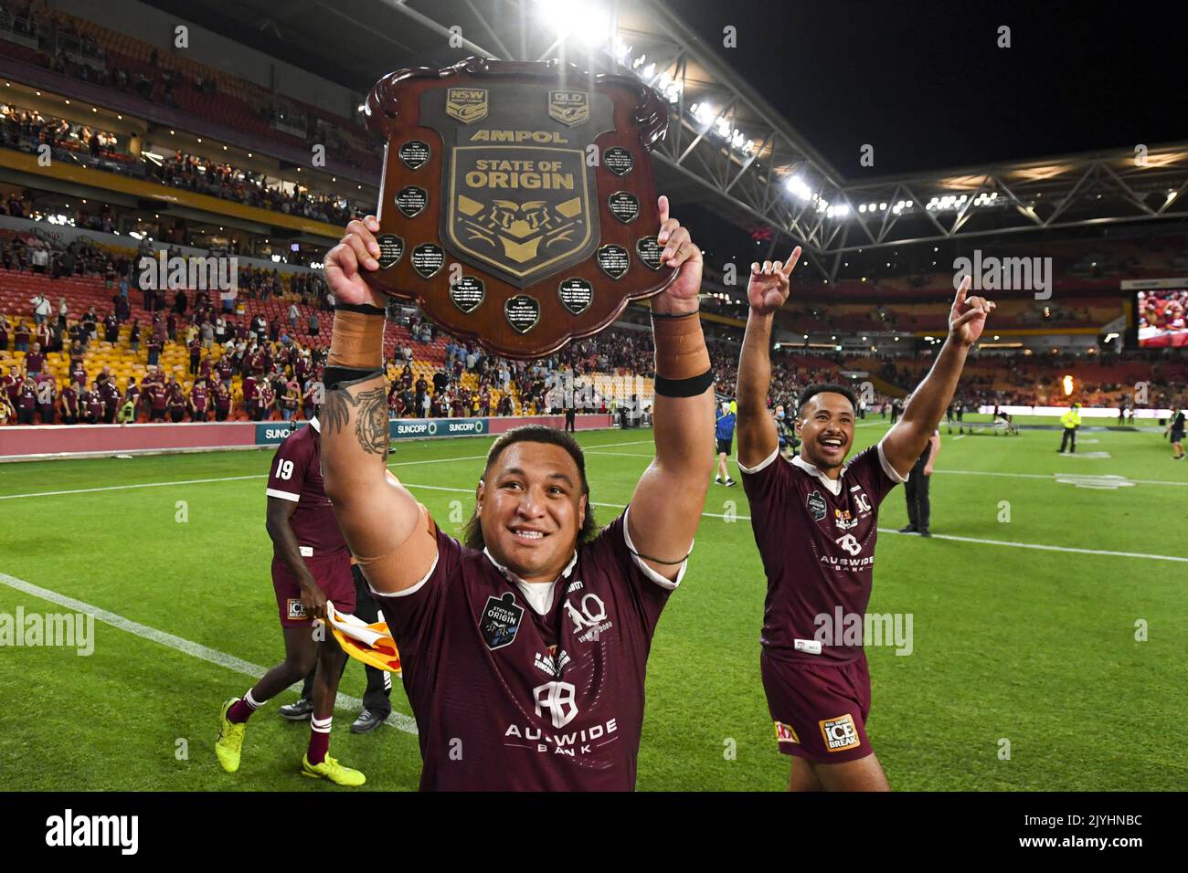 Josh Papalii of the Maroons celebrates with the trophy after winning ...