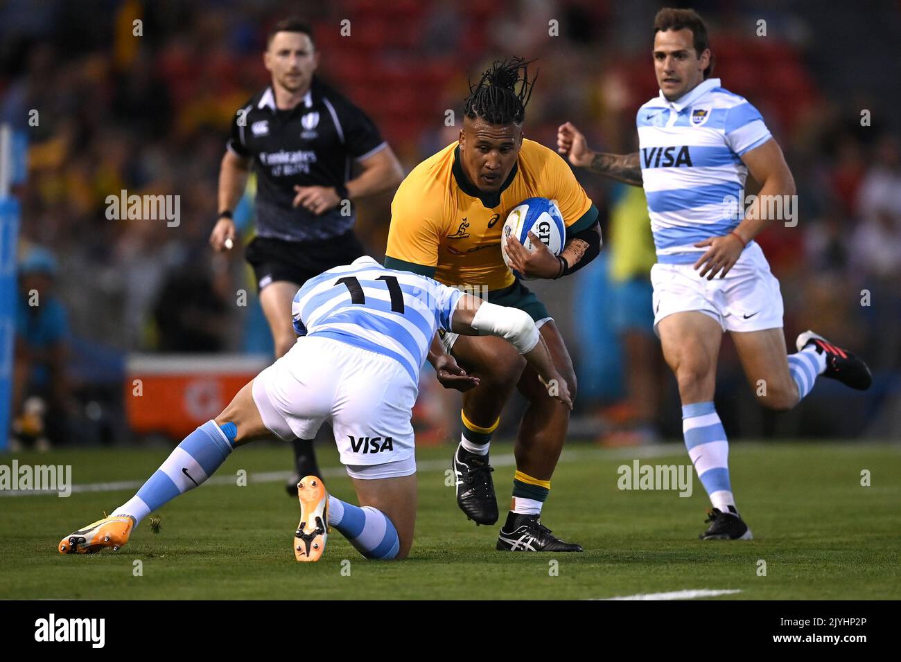 Brandon Paenga-Amosa of the Wallabies is tackled by Juan Imhoff of the ...
