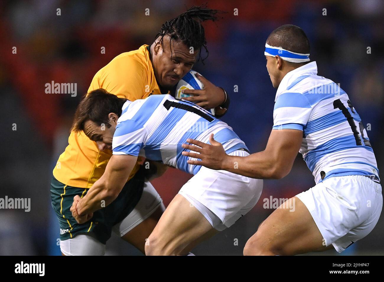 Brandon Paenga-Amosa of the Wallabies is tackled by Juan Imhoff of the ...